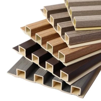 China Cheap Price Decorative House Building Materials Economical Wooden Grain Pvc Wpc Wall Panels for sale
