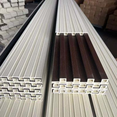China Waterproof Interior Wood Grain Polyvinyl Chloride Wall Panel Eco-friendly Decoration for sale