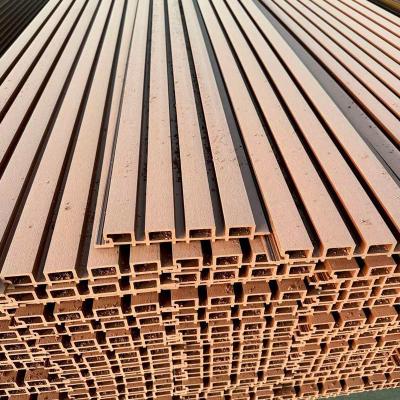 China Waterproof Wall Cladding WPC Exterior Outdoor Composite Wall Panel PVC Wood Wall Panel Outdoor Co-extruded Fluted Cladding Panel for sale