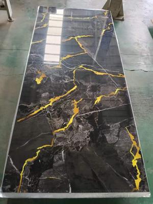 China New Design Gold Line Color UV Marble Sheet Wall Decor PVC Slat Carbon Cladding Artificial Stone Plastic UV Plate Wall Panel for sale