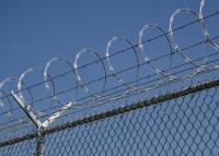 China High Strength Spiral Razor Wire Tape / Barbed Concertina Wire Fencing CBT 65 for sale
