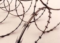China CBT Concertina Razor Barbed Wire Coil Used In Prison Barriers / Detention Camps for sale