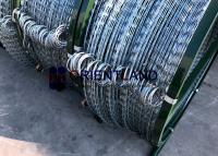 China Razor  Barbed Tape Concertina Coil , Mobile Security Razor Wire Mesh Fencing for sale
