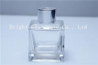 China clear perfume glass bottle with knob lid for sale