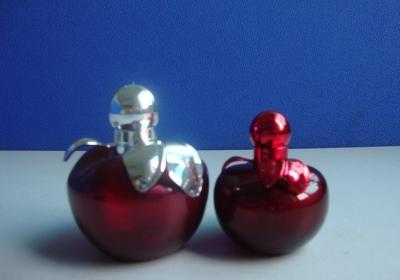 China Cute apple perfume glass bottle 50ml 100ml empty perfume bottle with pump sprayer for sale