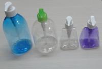 China 550ML Clear Empty Colored Plastic PET Cosmetic Jars And Containers With Various Pumps for sale