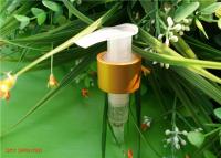 China Twist lotion pump 28 / 410 size with transparent head and shine golden closure for sale