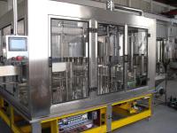 China 500ml Plastic Bottle Drinking Water Filling Machine Normal Pressure Gravity Filling Line for sale