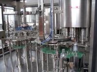China Gravity Still Water Rotary Filling Machines or Equipment for Plastic / PET Bottle for sale