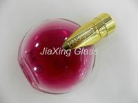 China New Luxury Perfume Glass Bottles Round Shape With Roll On Plastic Cap for sale