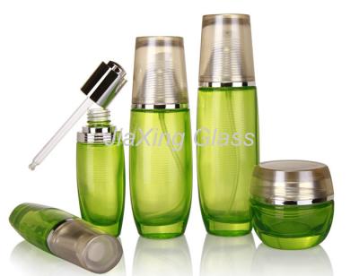 China Refillable Green Glass Cosmetic Bottles , Cosmetic Glass Jars 120ml With Plastic Caps for sale