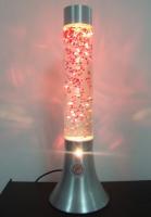 China cool Red  glass bottle Motion lamp with metal base for sale