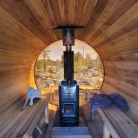 China Outdoor Panoramic Window Cedar Barrel Sauna Room With Wooden Fired Stove for sale