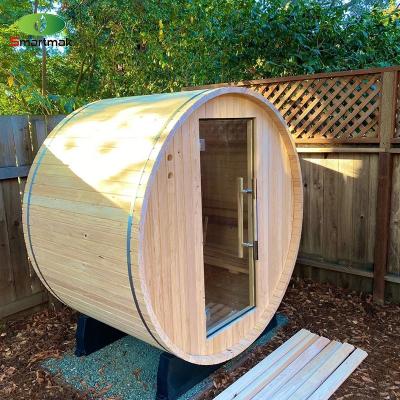 China 5 Person Outdoor Sauna Canadian Cedar Heater Wood Barrel Sauna With Front Porch for sale