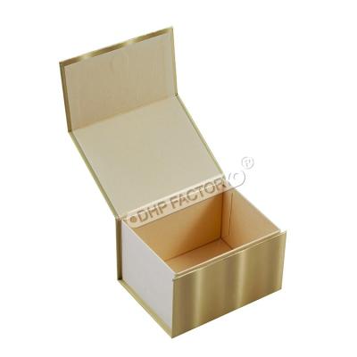 China Luxury Paper Rigid Cardboard Magnetic Gift Gold Box With UV Logo for sale