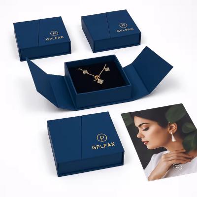 China Navy Blue Jewelry Box Magnetic Double Door Luxury Gift Box For Wedding Rings for sale