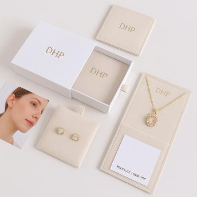 China Presentation Rigid Jewelry Packaging Sliding Box With Gold Foil Stamping Logo for sale