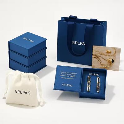 China Premium Blue Book Shape Recycled Jewelry Gift Box With Cushion For Necklaces Ring for sale