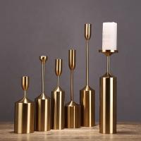 China Golden Lighthouse Long Stem Metal Candle Holder For Home Decoration for sale