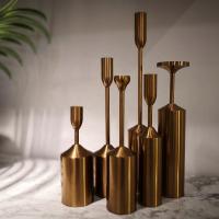China Golden Lighthouse Long Stem Metal Candle Holder For Home Decoration for sale