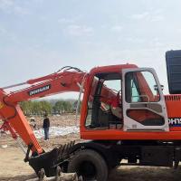 China Doosan DX150-7 Used Wheel Excavator 0.6m3 Bucket Capacity 86kw Rated Power for sale