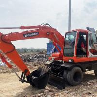 China Doosan DX150-7 Used Wheel Excavator 0.6m3 Bucket Capacity 86kw Rated Power for sale