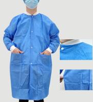 China Breathable Waterproof Disposable Lab Coat In White And Blue 10pcs/case for sale
