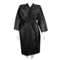 China Adults Disposable Salon Capes , OEM 50gsm Disposable Hairdressing Gowns for sale