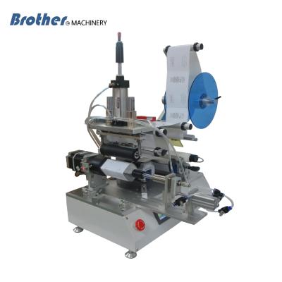 China 360 Degree Roller Labeling Machine Semi Automatic  For Cosmetic Bottles Packaging Boxes And Plastic Caps BML616 for sale