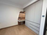 China Floor-to-Ceiling Flat Wardrobe Doors with Integrated Desk Segment for sale