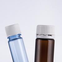China Polyester PE Tan Liquid Medicine Bottles Plastic Alcohol Bottles for sale