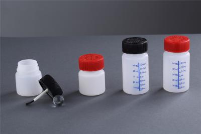 China Hdpe Viscous Plastic Bottle With Brush 50ml Plastic Round Bottle for sale
