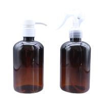 China Amber Clear 60ml Plastic Lotion Bottles Round Shampoo Bottle for sale