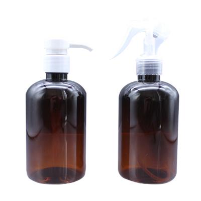 China Amber Clear 60ml Plastic Lotion Bottles Round Shampoo Bottle for sale
