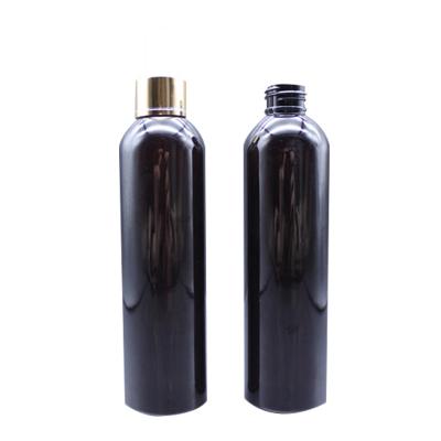 China PET 60ml Eco Friendly Shampoo Packaging Amber Plastic Refillable Shampoo Bottles for sale