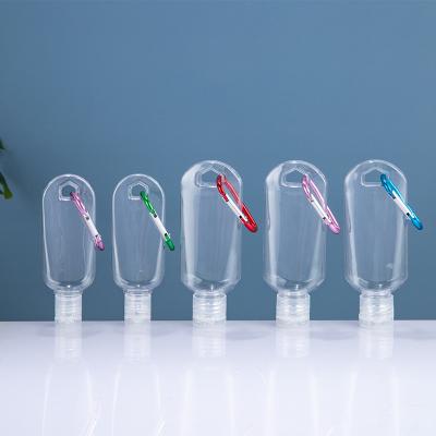 China 50ML Transparent Empty Travel Bottle bulk With Hook Alcohol Refillable Filp Cap for sale