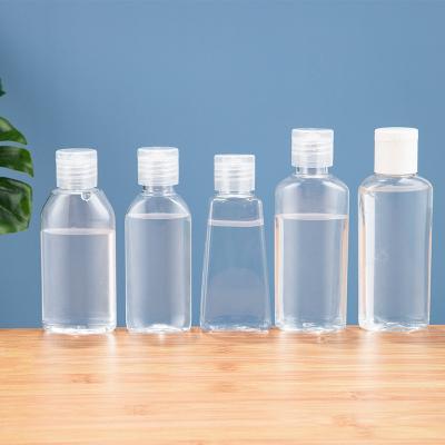China 2oz /60ml Clear PET Hand Sanitizer Bottle With Flip Cover Flat Shape for sale