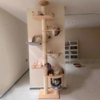 China Luxury Sisal Wood Floor-to-Ceiling Pet House Tower Climbing Frame Jumping Platform Tree Condo Furniture Cat Scratcher Toy for sale
