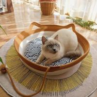 China Best Selling Striped Pattern Modern Style Handwoven Grass Round Portable Removable Washable Pet Bed for Cats for sale