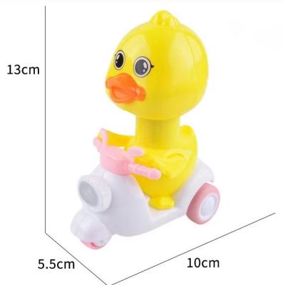 China Wholesale Toys Rubber Ducklings Children's Pressure Inertia Return Little Yellow Duck Riding Duck Toy for Child for sale