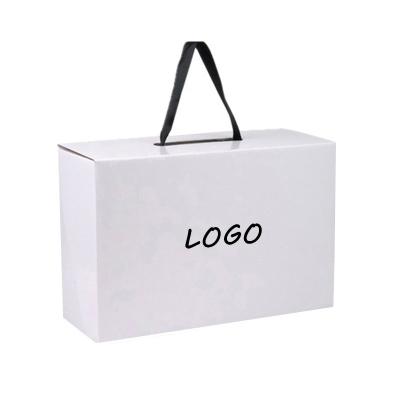 China Custom Order Accepted Mini Folding Empty Handbag Clothing Packaging Storage Case Box for sale