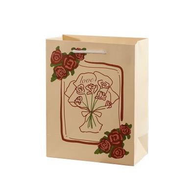 China Luxury Handheld Custom Printed Kraft Paper Bags Painted Rose Flowers for sale
