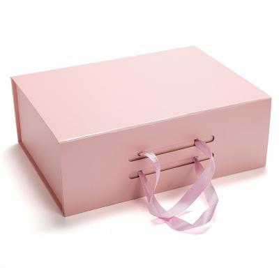 China Cosmetic Folding Corrugated Cardboard Gift Boxes Gift Hamper With Ribbon for sale