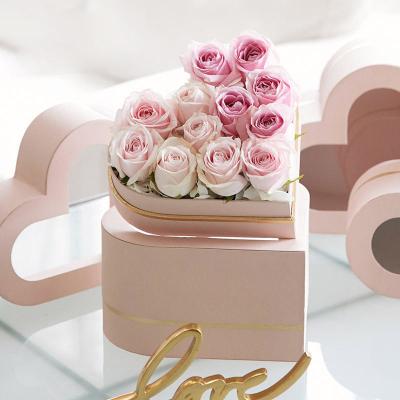 China Simple Luxurious Creative Colorful Romantic Heart Flower Box Packaging with PVC Window for sale