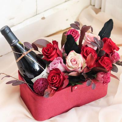 China Rectangular Portable Artificial Fresh Rose Round Hat Handle Flower Boxes with Own Logo for sale
