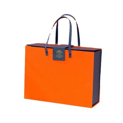 China Valentine's Day Customized Folding Magnetic Suitcase Mailer Clamshell Paper Gift Box for sale