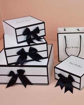 China Foldable Paperboard Perfume Wedding Gift Packaging Box With Ribbon Magnetic Closure for sale