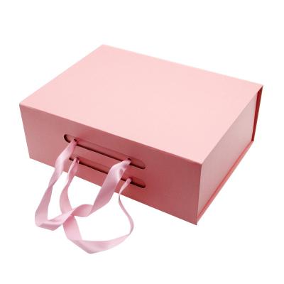China Customized Foldable Gift Box with Ribbon Handle Hard Cardboard Packaging 20x20x10cm for sale