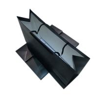 China Custom CMYK Nylon Handle Paper Shopping Bags Bulk 20x30cm for Retail Gift Packaging for sale