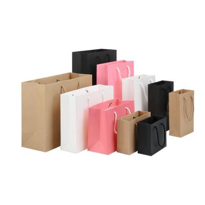 China Custom Recycled Kraft Paper Shopping Bags with 4C Printing and Nylon Handles 1000pcs MOQ for sale